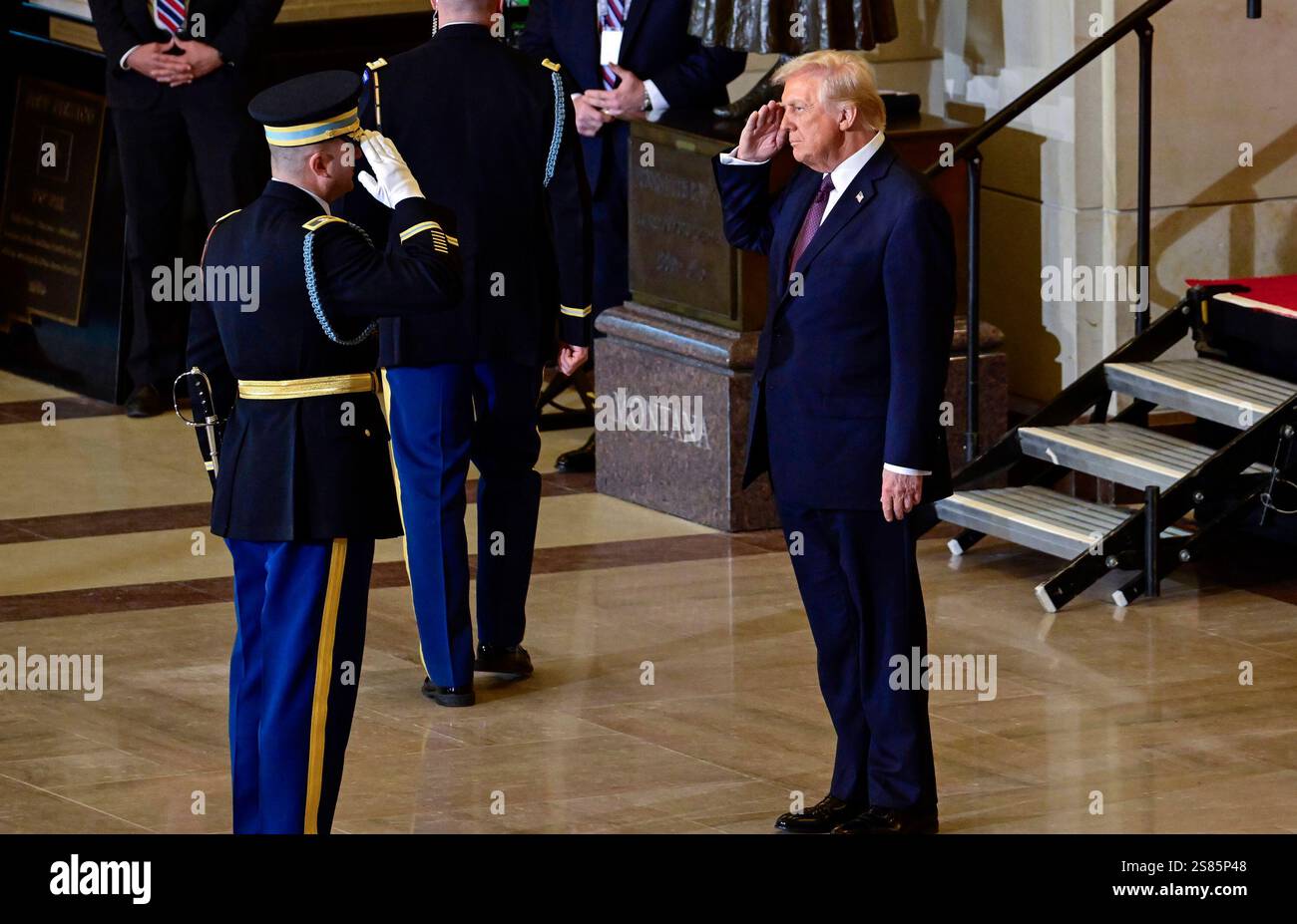 United States President Donald J Trump salutes as he participates in a ...