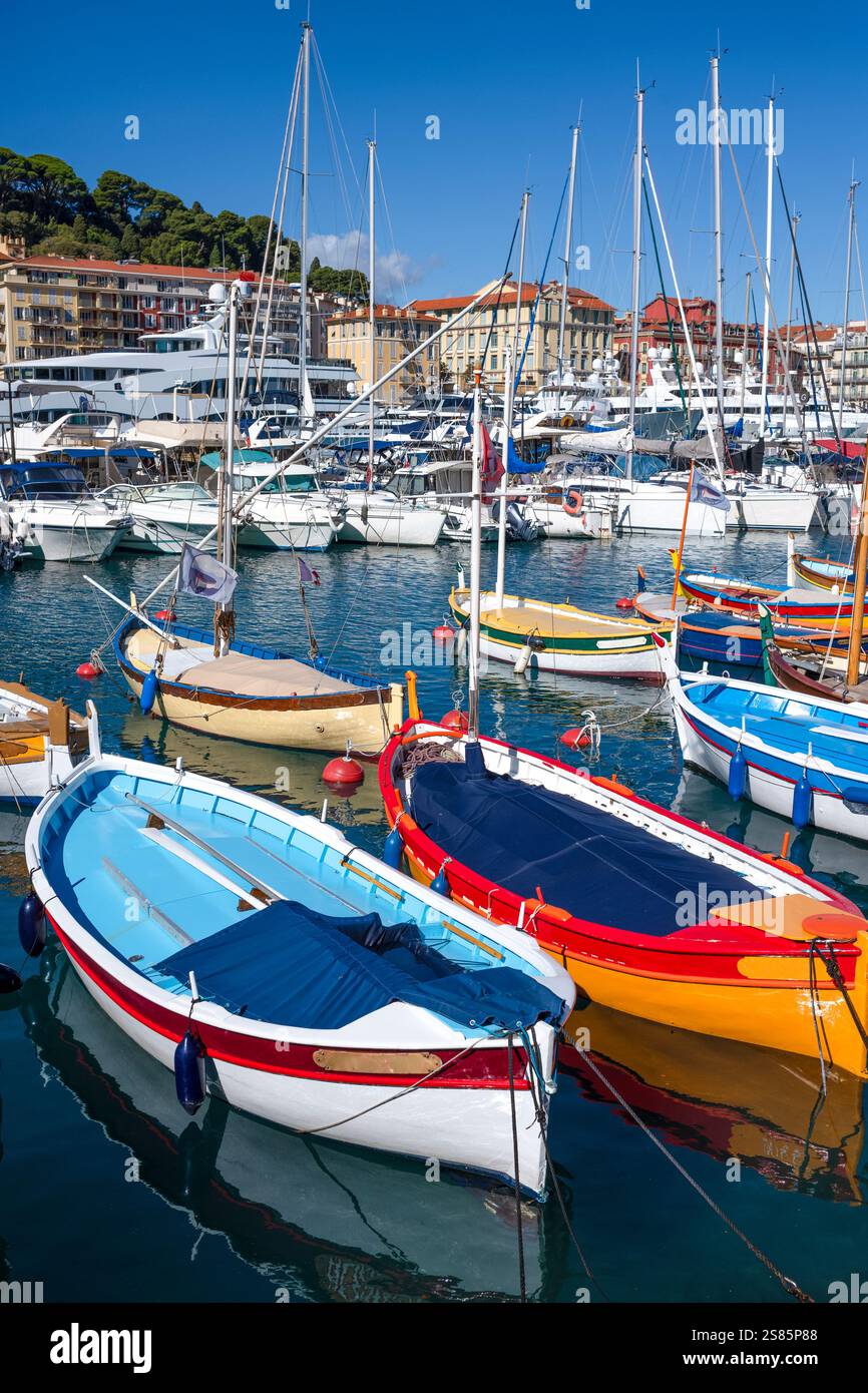Traditional colourful fishing boats moored in Port de Nice, UNESCO ...