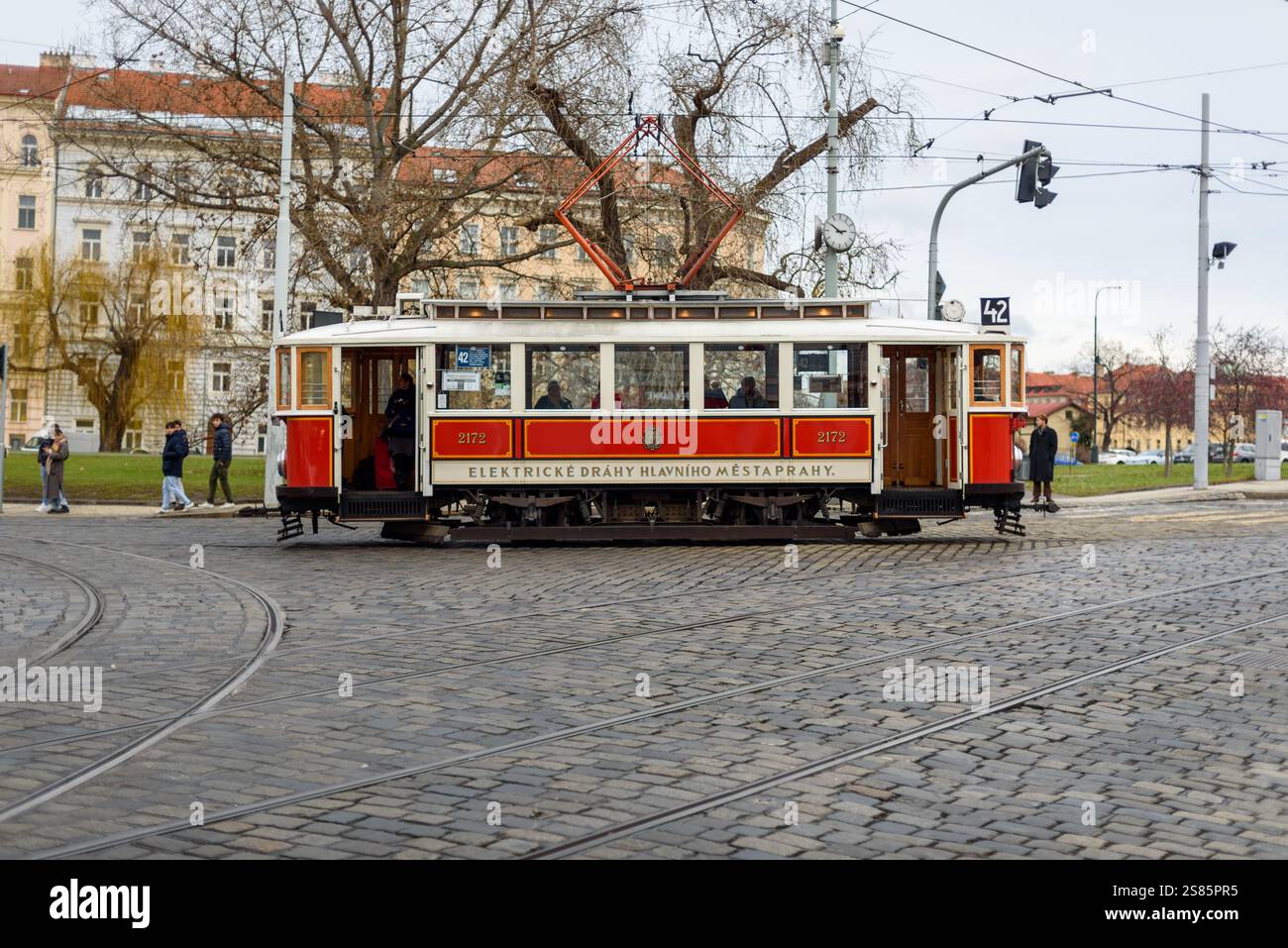 Red vintage retro tram, historic tourist line number 42, in the streets ...
