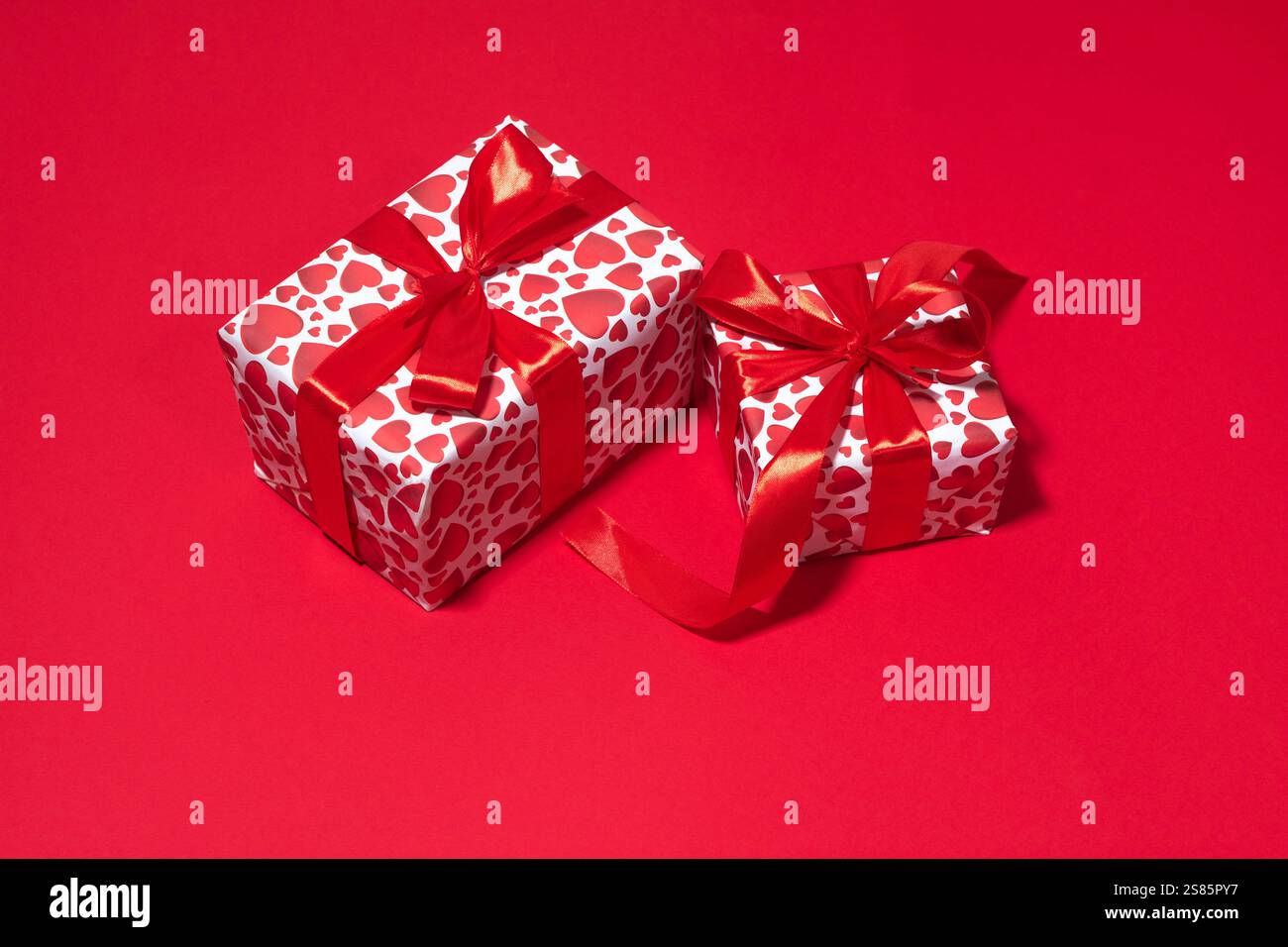 Valentine's Day Gift Boxes with Red Ribbon Stock Photo - Alamy