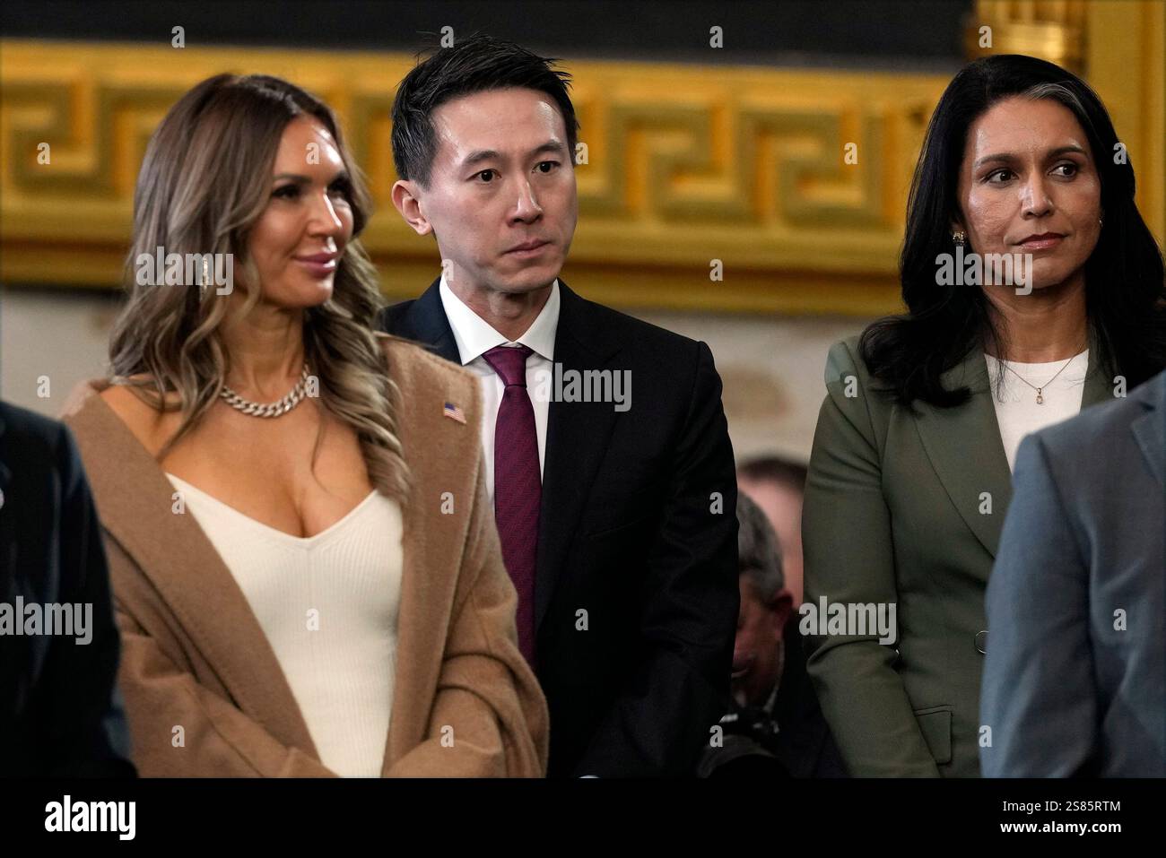 China’s Vice President Han Zheng, center, stands with Tulsi Gabbard ...