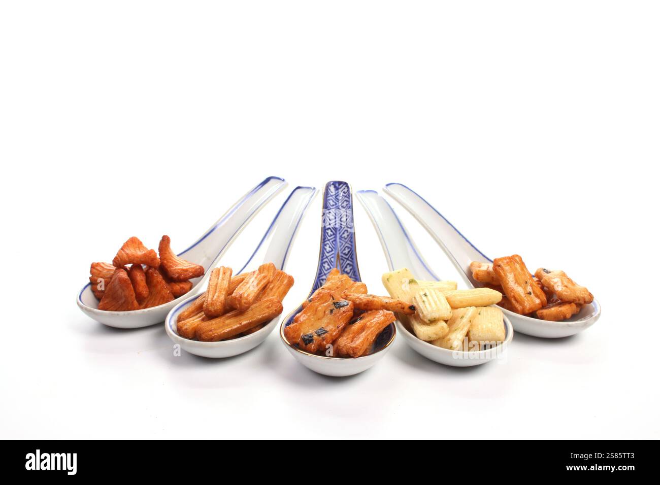 Hot and spicy Japanese rice crackers on a white backgroud Stock Photo ...