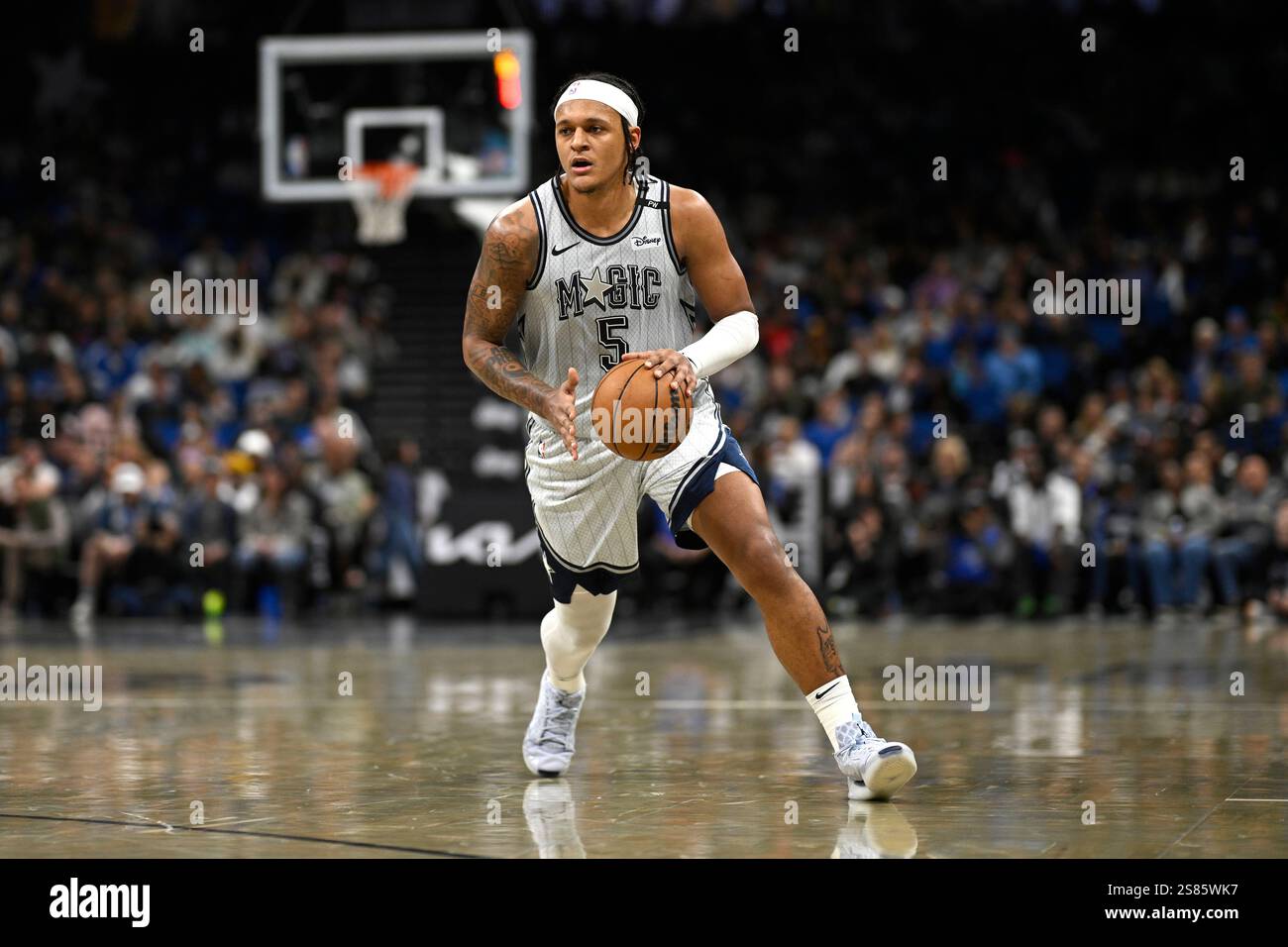 Orlando Magic forward Paolo Banchero (5) brings the ball up the court ...