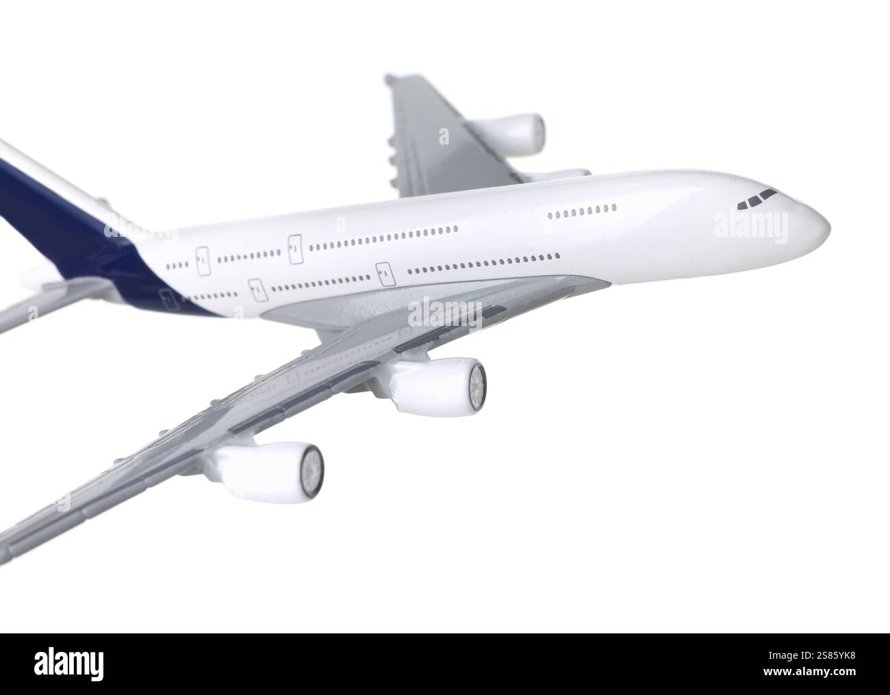 Plane model in air on white background Stock Photo - Alamy