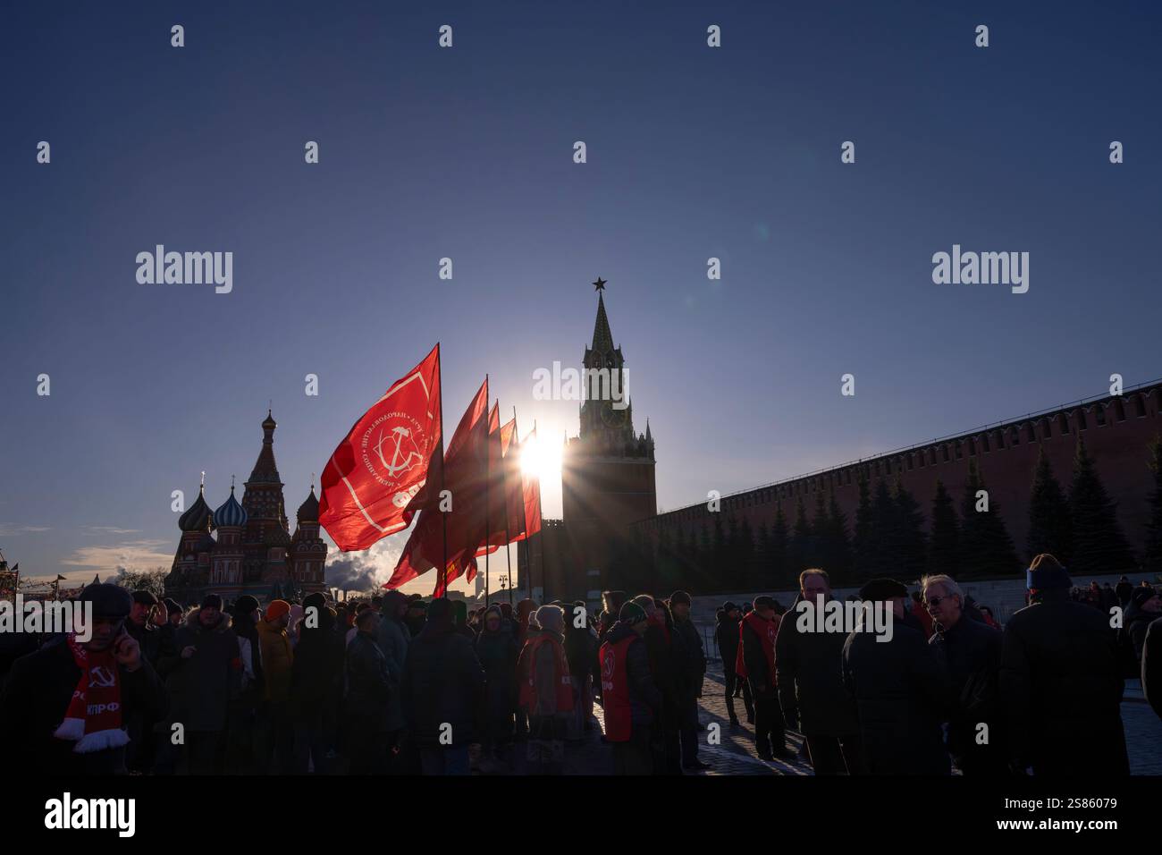 Russian Communist supporters gather with red flags on Red Square to lay ...