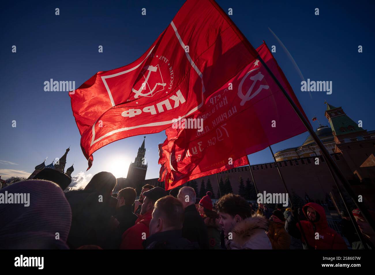 Russian Communist supporters gather with red flags on Red Square to lay ...