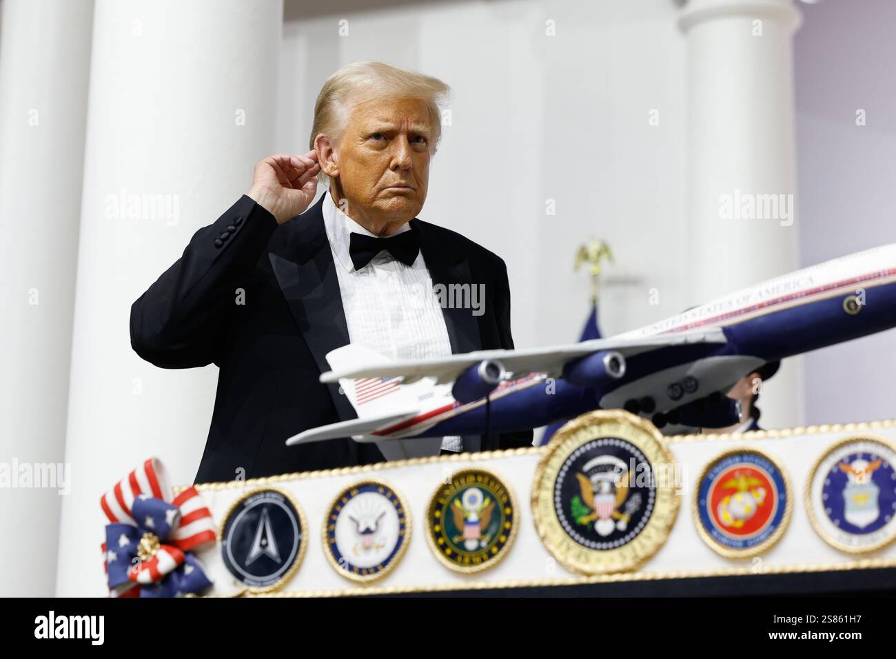 WASHINGTON, DC - JANUARY 20: President Donald Trump cuts a cake at the ...