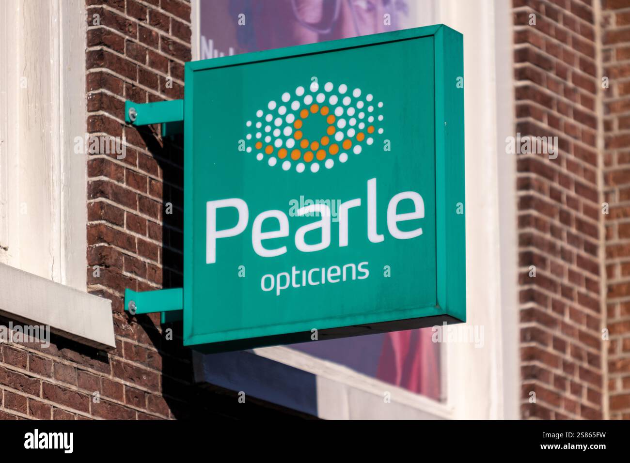Pearle Opticien shop, flag sign above the store entrance Stock Photo ...