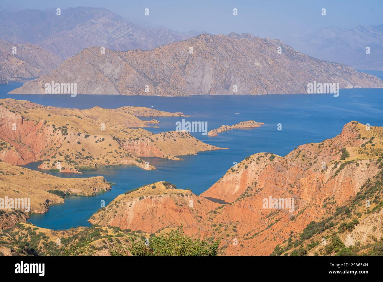 Colorful landscape view of Nurek dam lake on Vakhsh river between ...