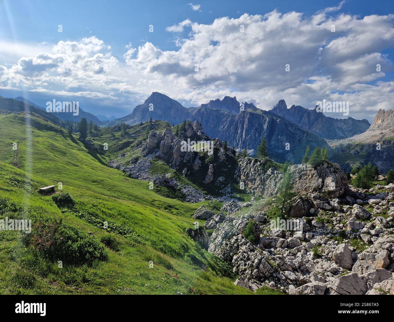 Breathtaking alpine landscape in the Dolomites of rolling green hills ...