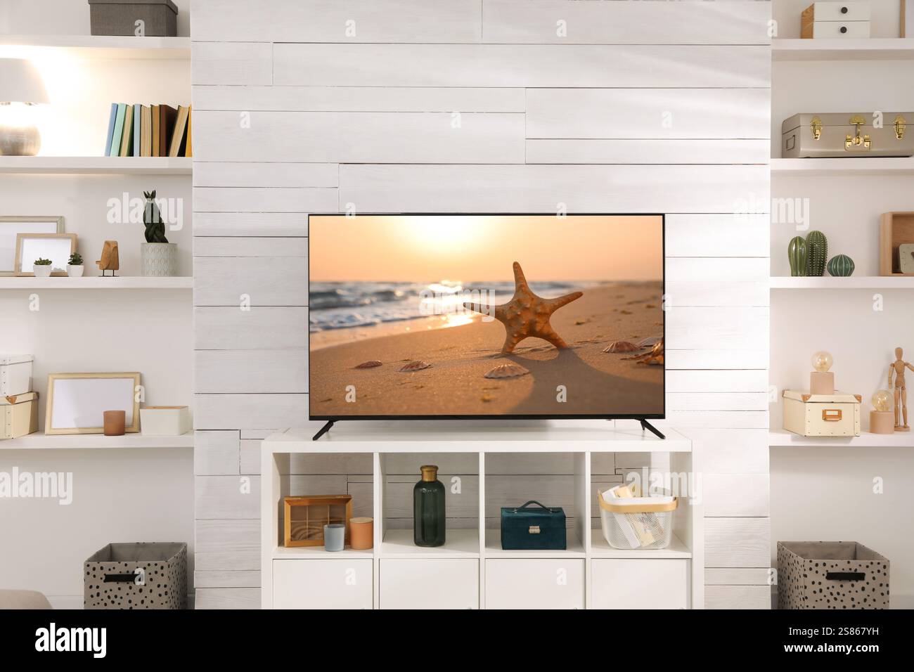 TV set with nature landscape on screen in room Stock Photo - Alamy
