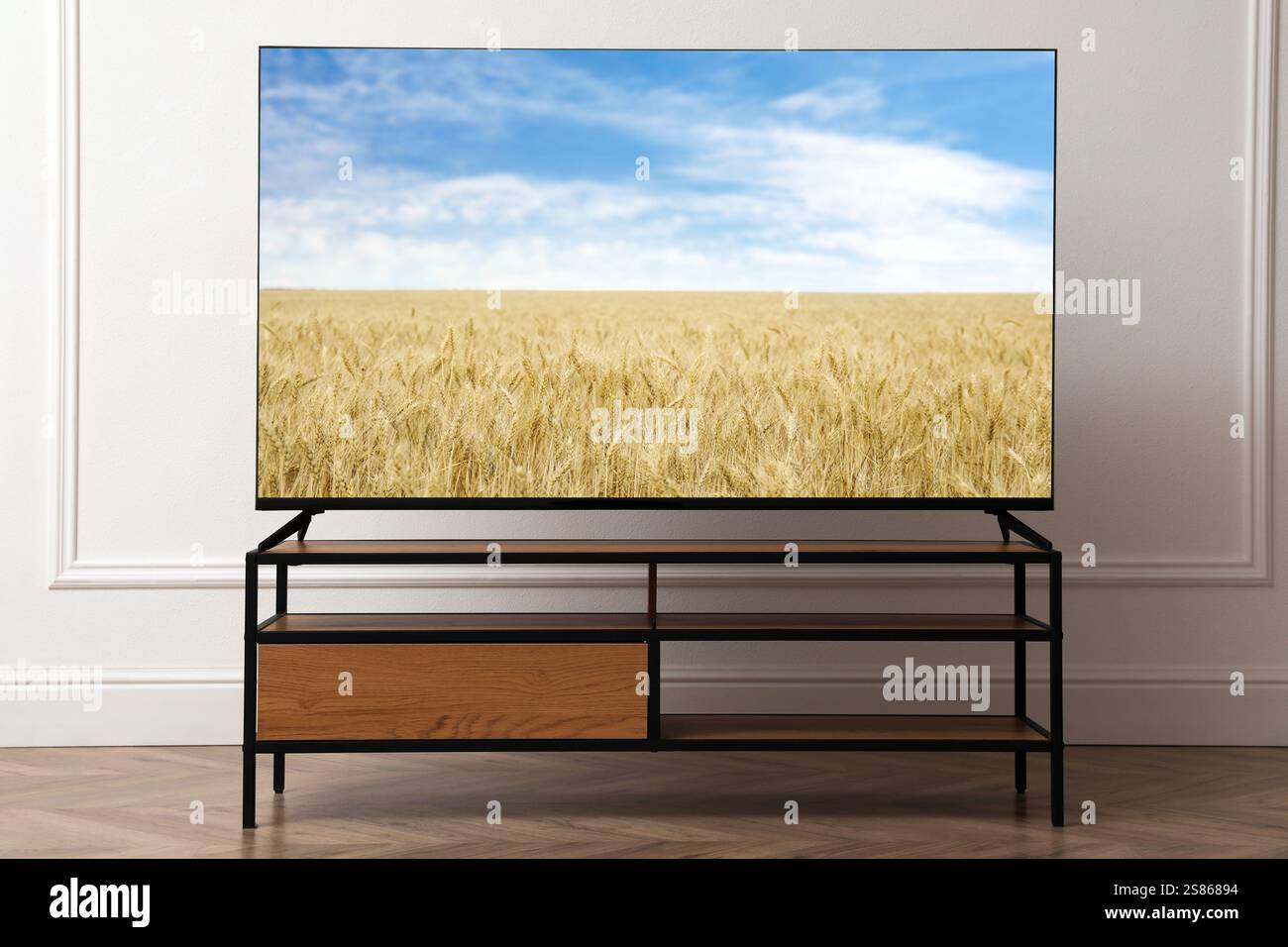 TV set with nature landscape on screen in room Stock Photo - Alamy