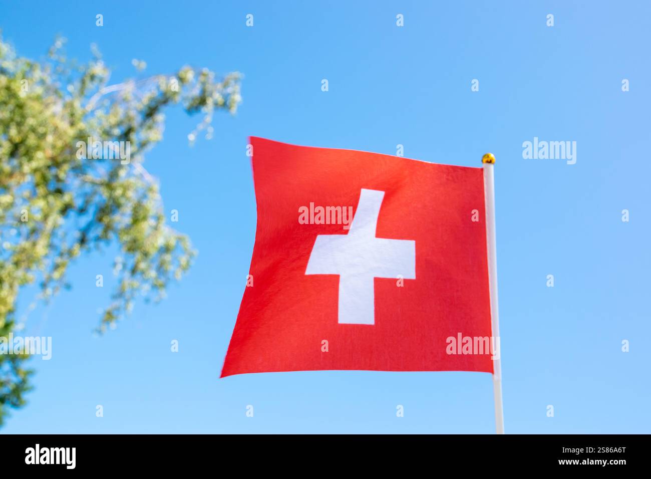 Flag of Switzerland in the sky. Sing with nature background Stock Photo ...