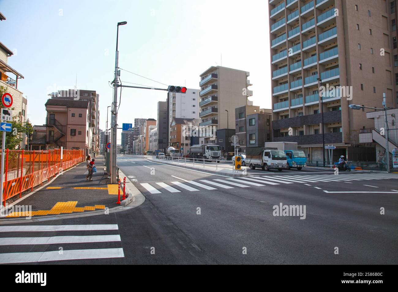 Streets and buildings and a pedestrian crossing in Akabane ...
