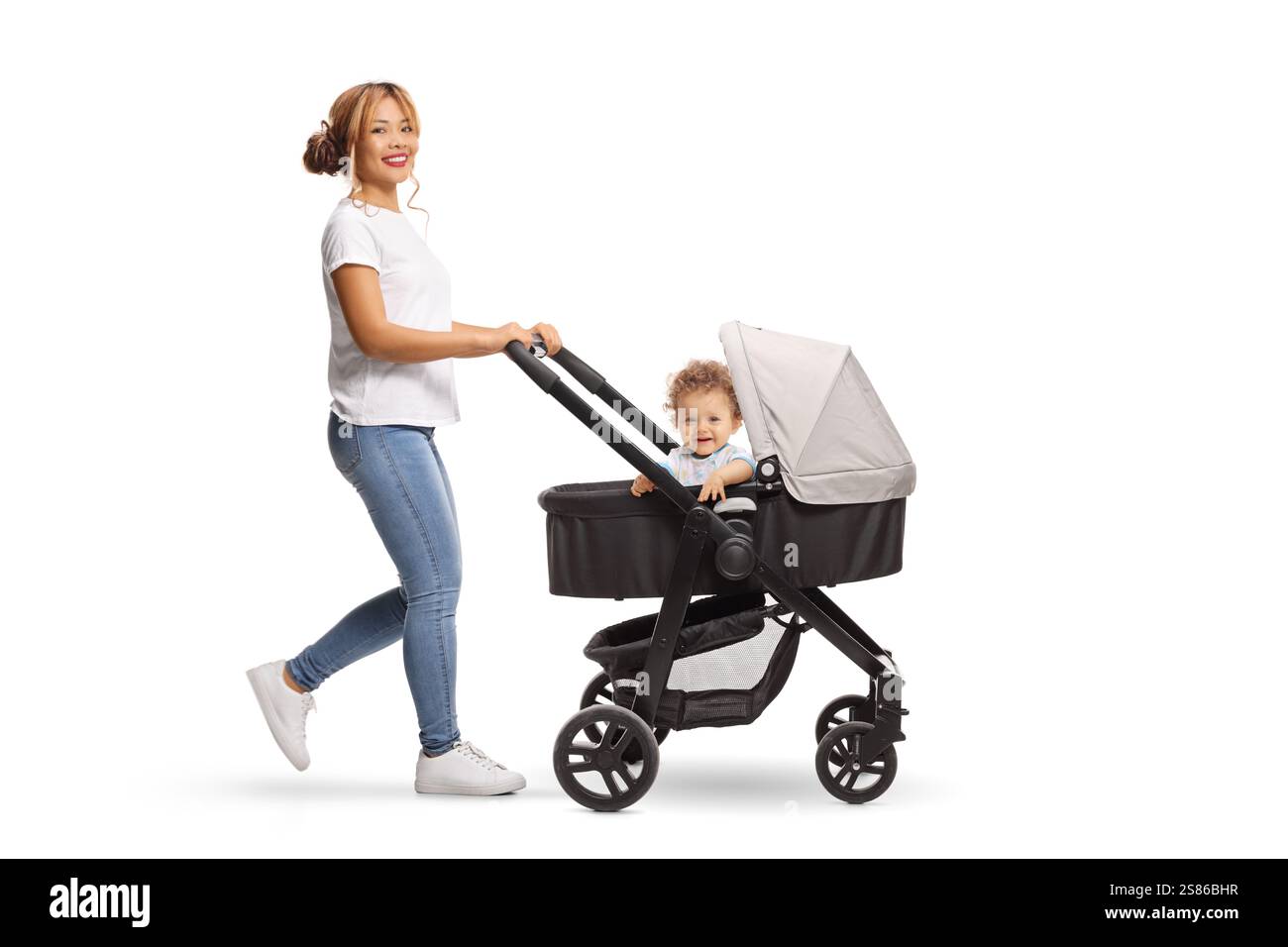 Full length shot of a young asian mother pushing a kid in a stroller ...