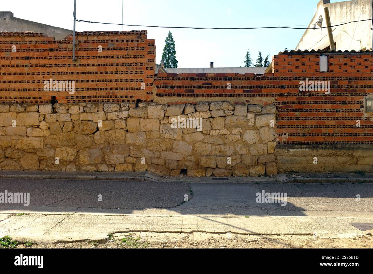 Stone and brick badly built wall, Monzón de Campos, Palencia Province ...