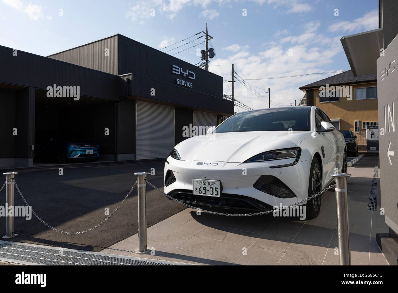 In this photo illustration, Chinese electric car manufacturer BYD ...