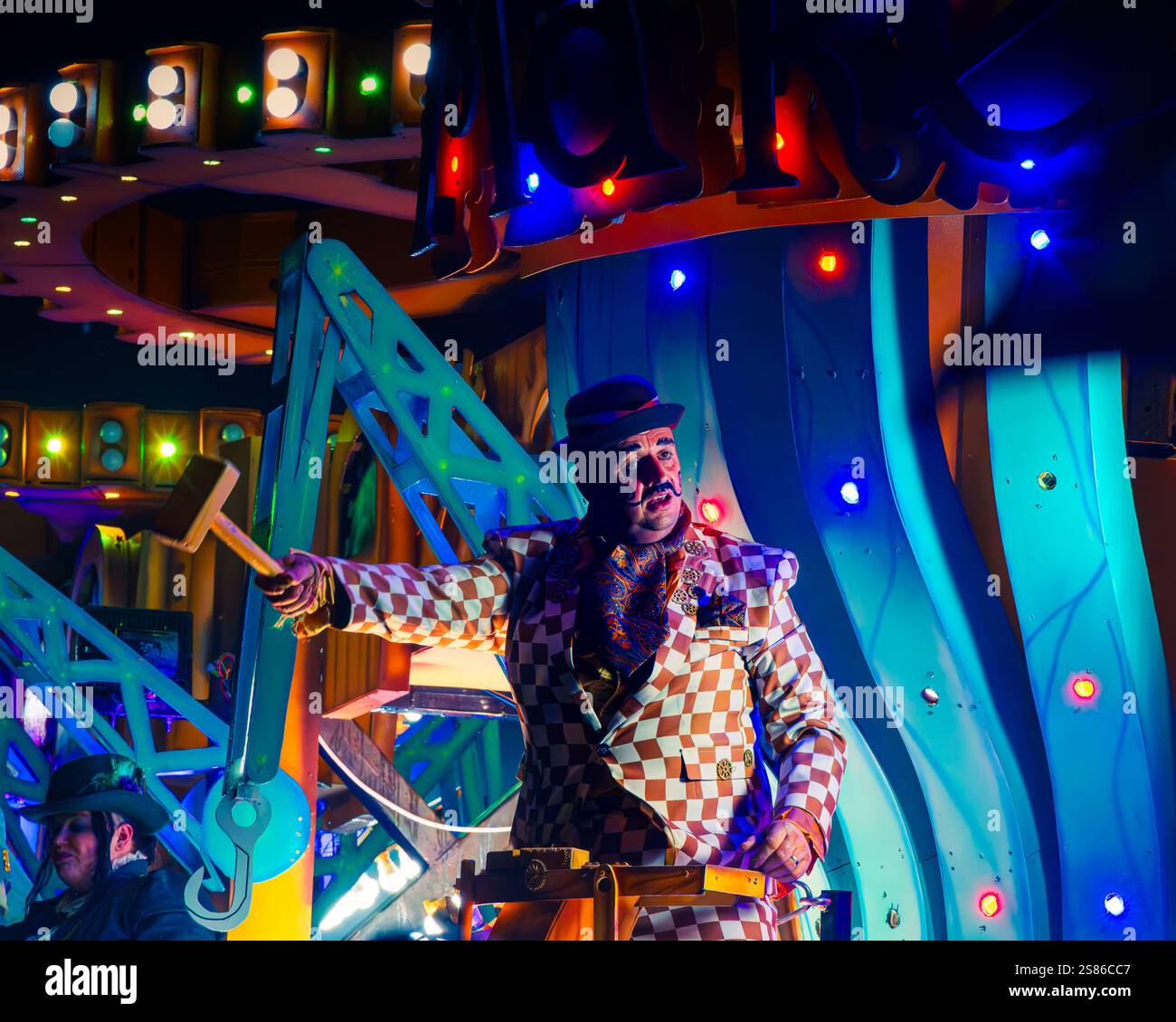 Glastonbury Carnival male performer as a circus clown on a fairground ...