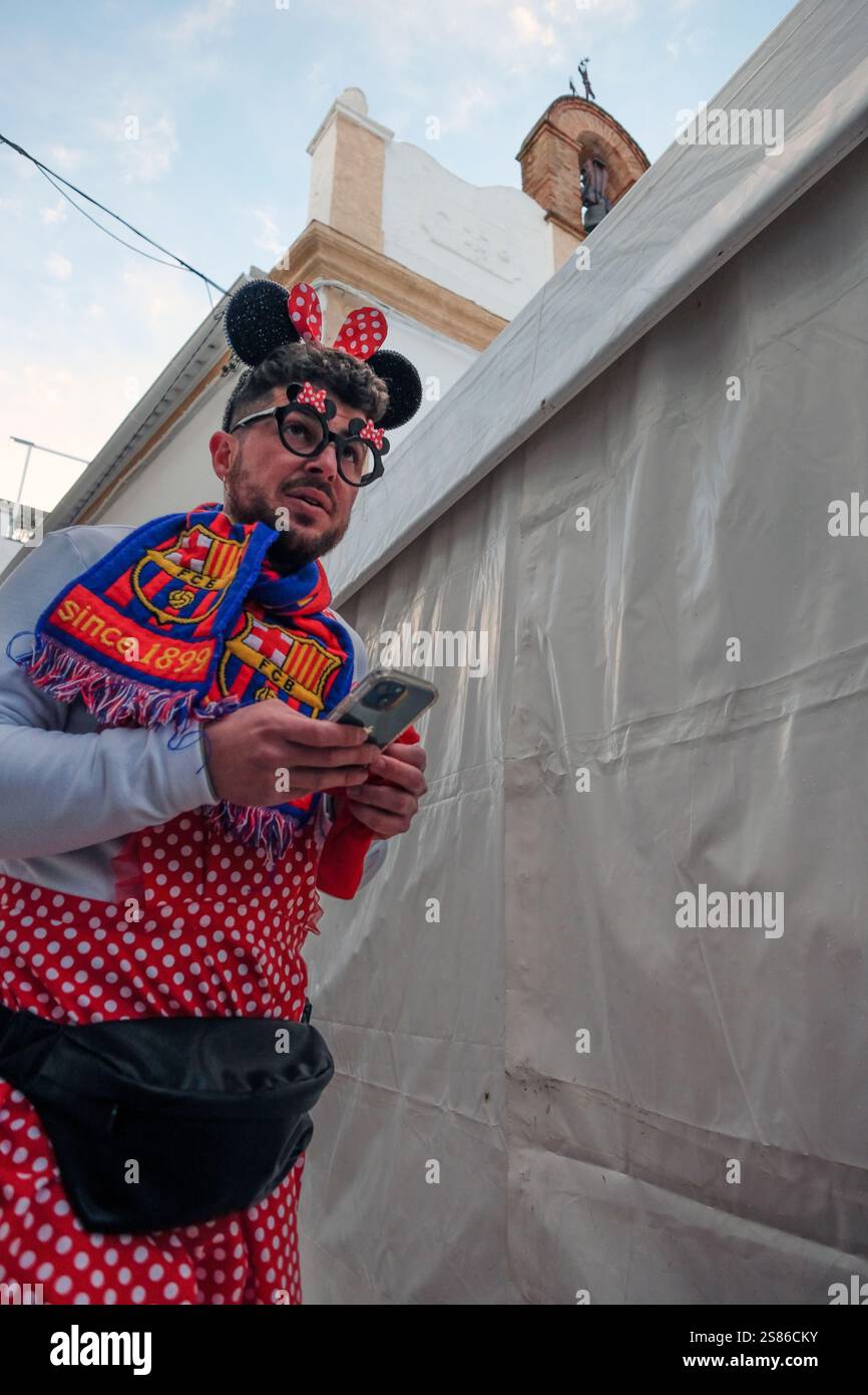 Man in Mickey Mouse costume at Easter carnival, Carcabuey, Cordoba ...