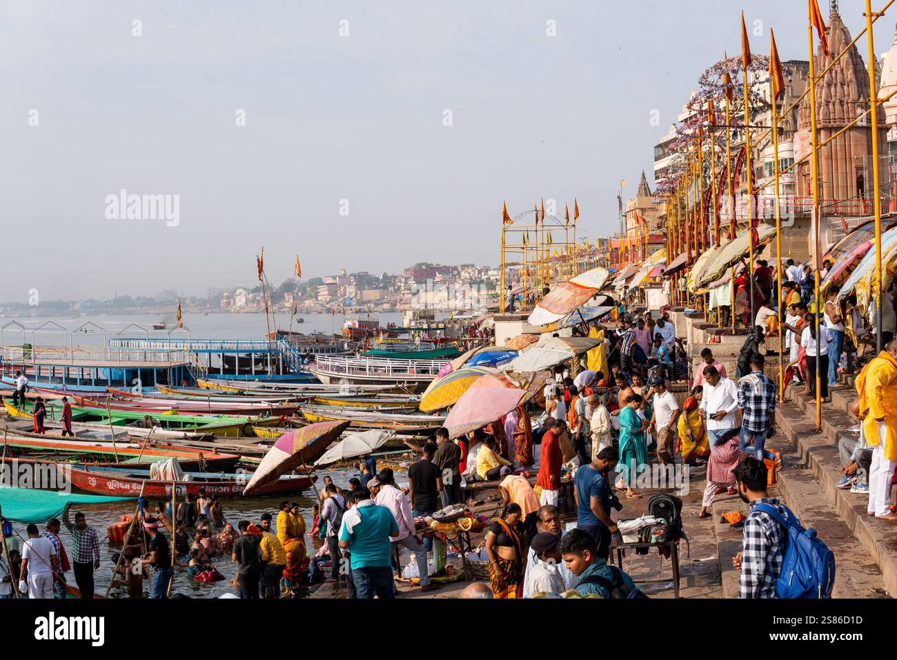 VARANASI, INDIA - APRIL 10, 2024: Ganges river waterfront with old ...
