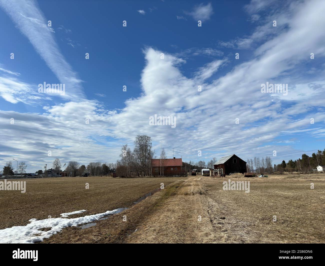 Spring landscape in a small village in north Sweden Stock Photo - Alamy