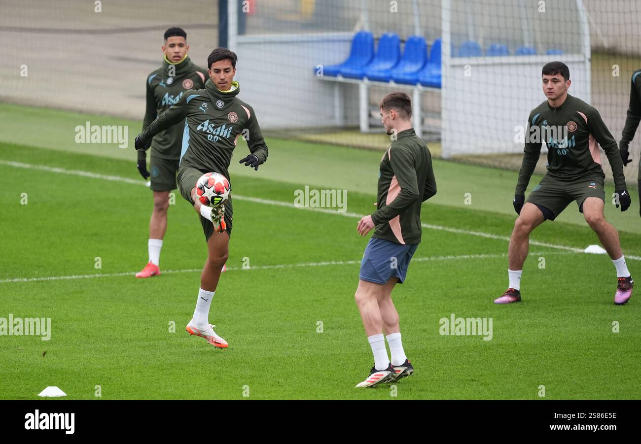 Manchester City's Vitor Reis (left) and Abdukodir Khusanov (far right ...