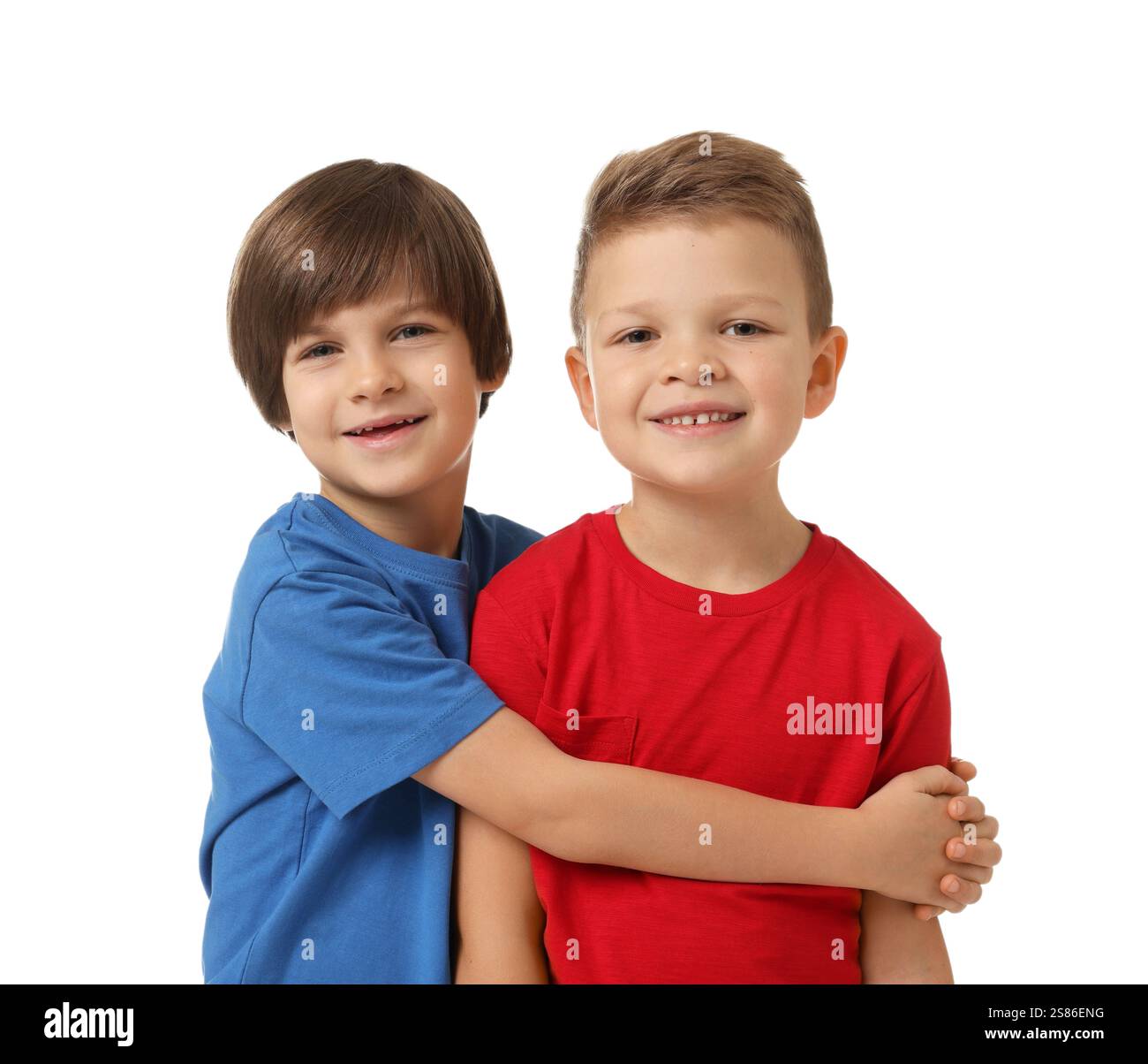 Portrait of cute brothers on white background Stock Photo - Alamy