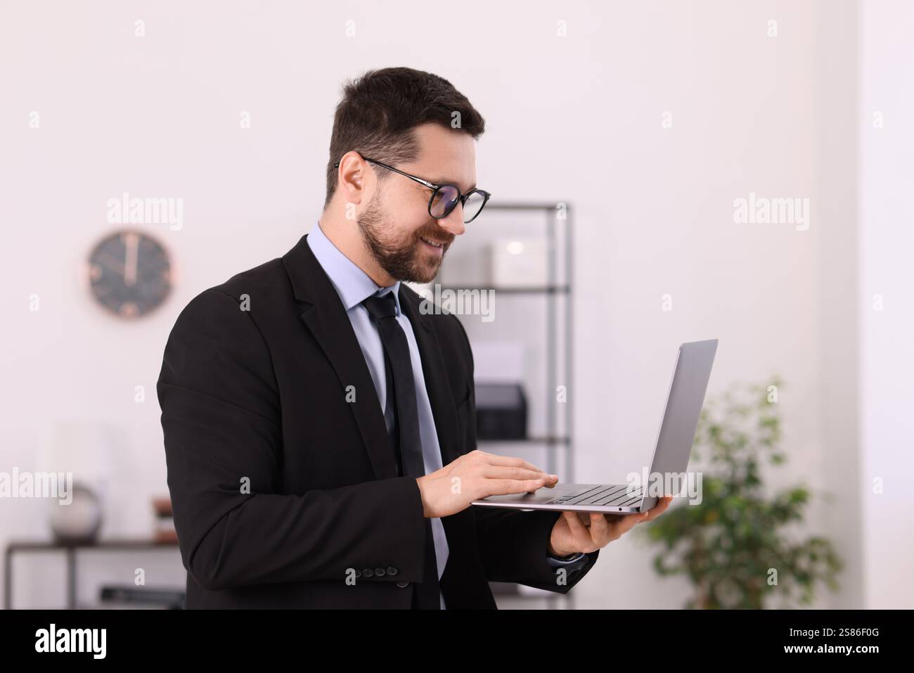 Portrait male consultant using hi-res stock photography and images - Alamy