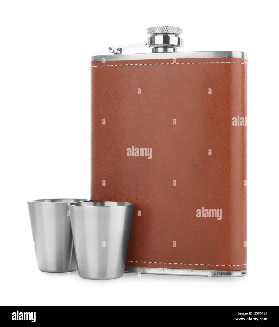 Hip flask and cups isolated on white Stock Photo - Alamy