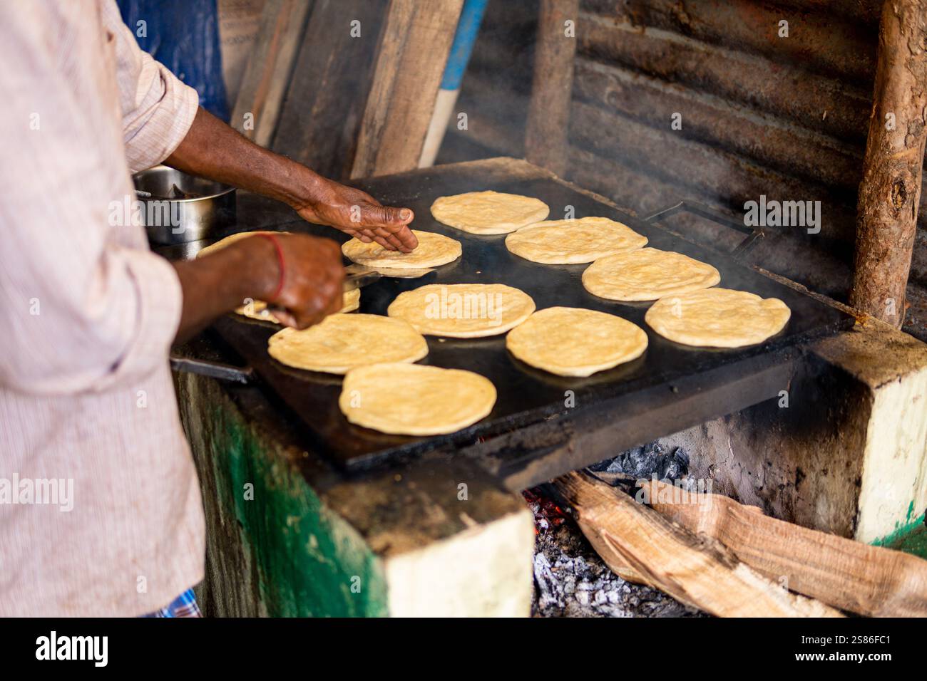 Preparation chapati in traditional hi-res stock photography and images ...