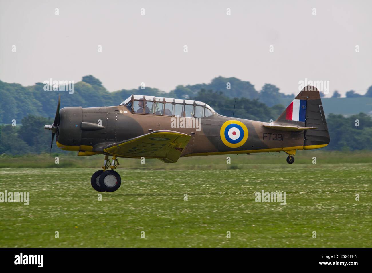 RAF North American Harvard AT-16 IIB in flight but landing Stock Photo - Alamy