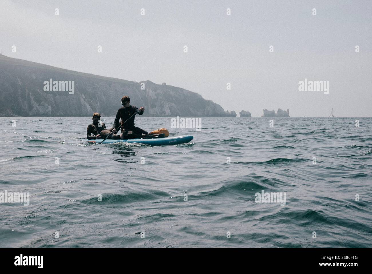 Man paddling surfboard kayak hi-res stock photography and images - Alamy