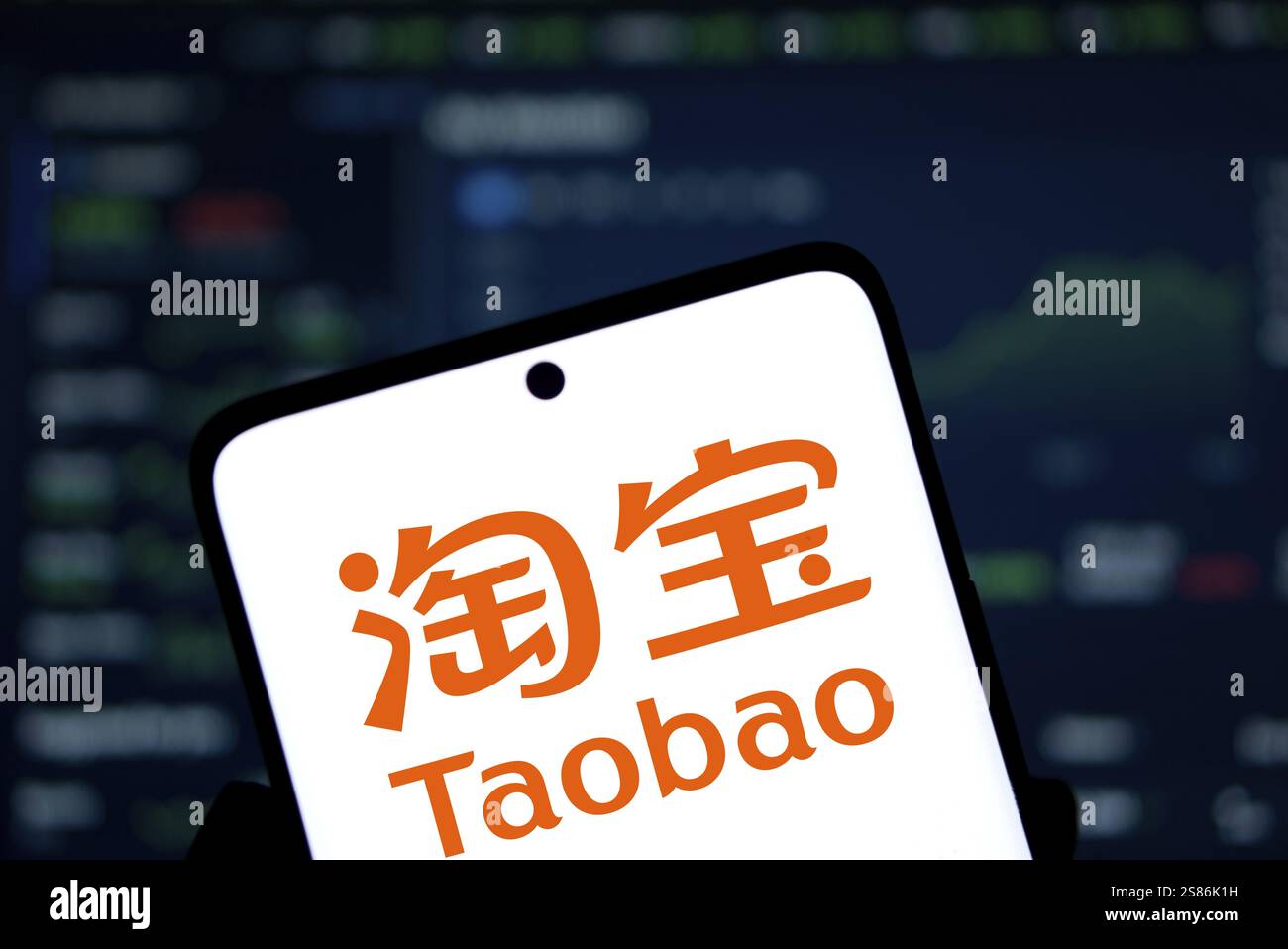 taobao logo is displayed on smartphone.Taobao is a Chinese online shopping platform Stock Photo ...