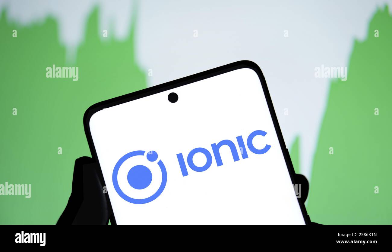 Ionic logo is displayed on smartphone. Ionic is an open-source UI toolkit for building cross ...