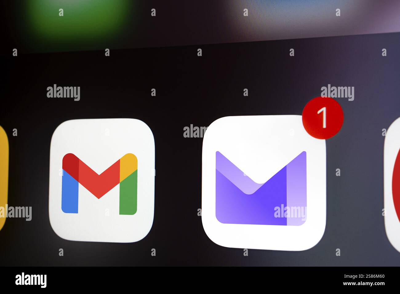 A close up of an iPhone screen displaying the Google Gmail and Proton ...
