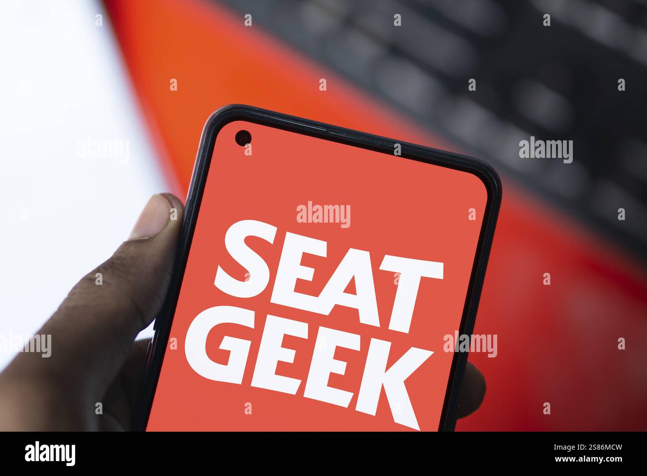 Seatgeek logo is displayed on smartphone. SeatGeek is a mobile-focused ...