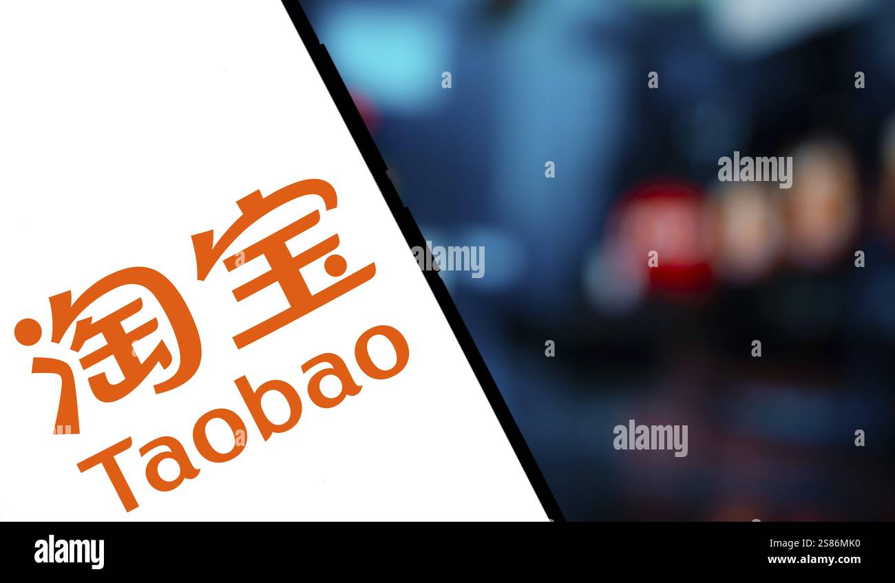 taobao logo is displayed on smartphone.Taobao is a Chinese online ...