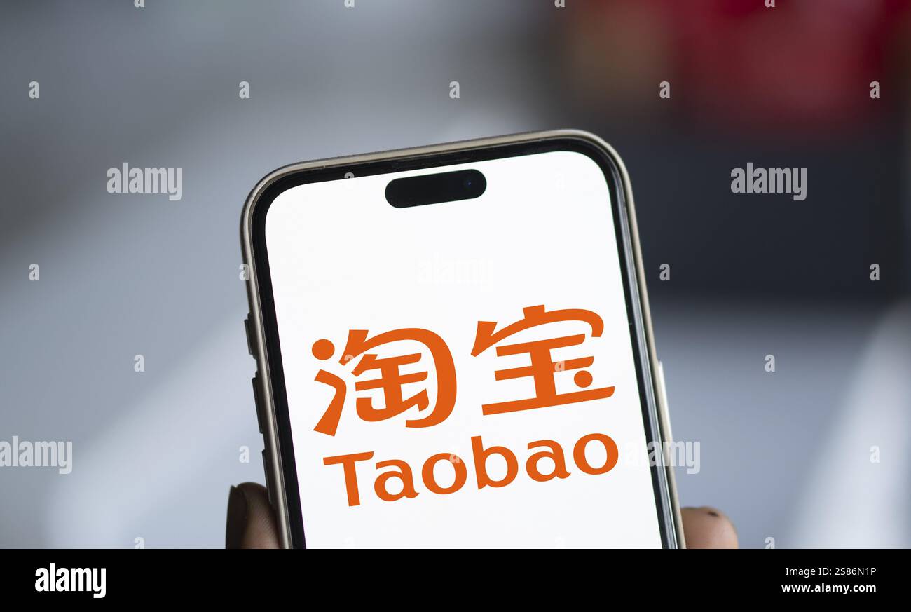 taobao logo is displayed on smartphone.Taobao is a Chinese online shopping platform Stock Photo ...