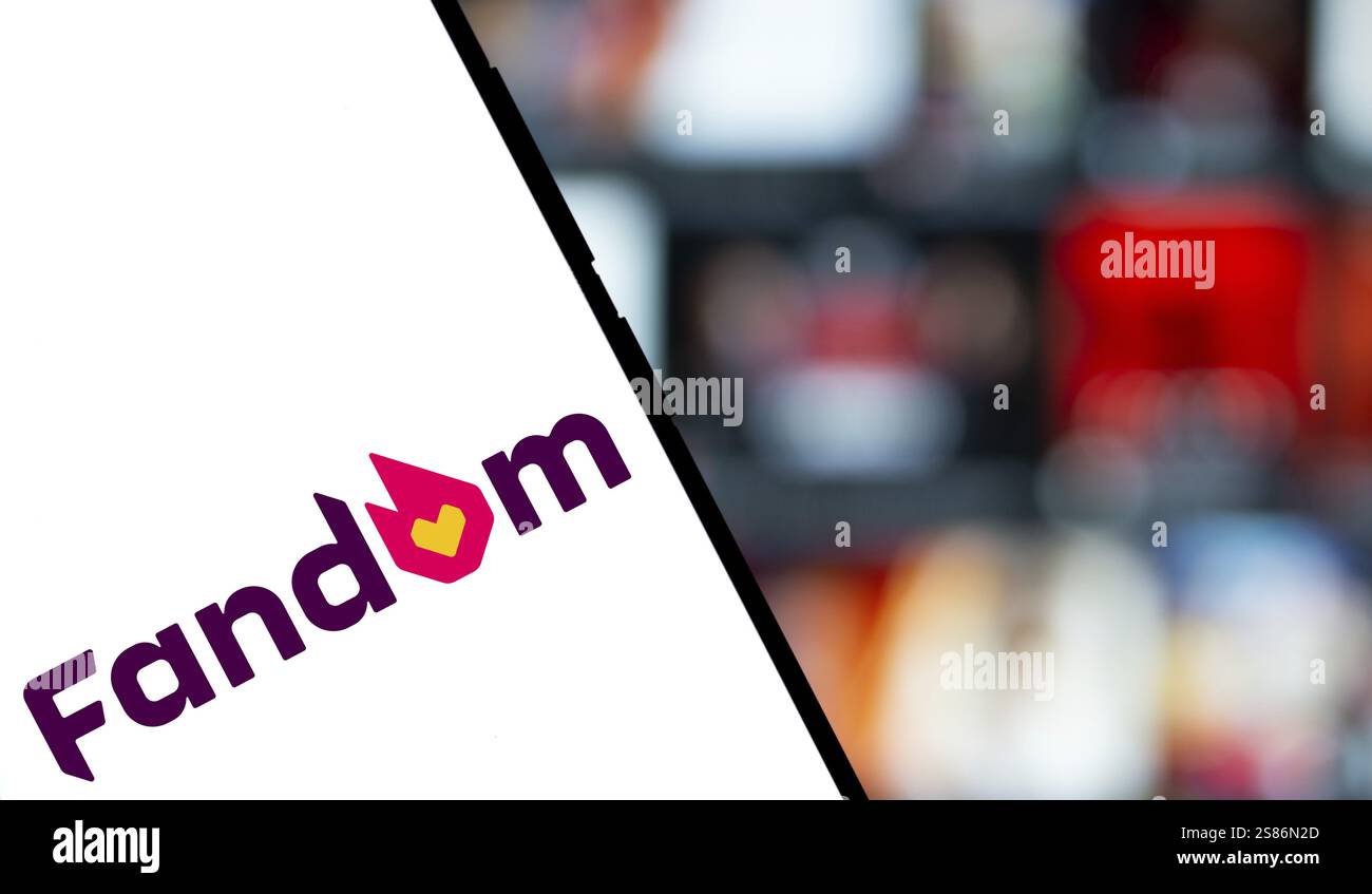 Fandom logo is displayed on smartphone. Fandom is a wiki hosting ...