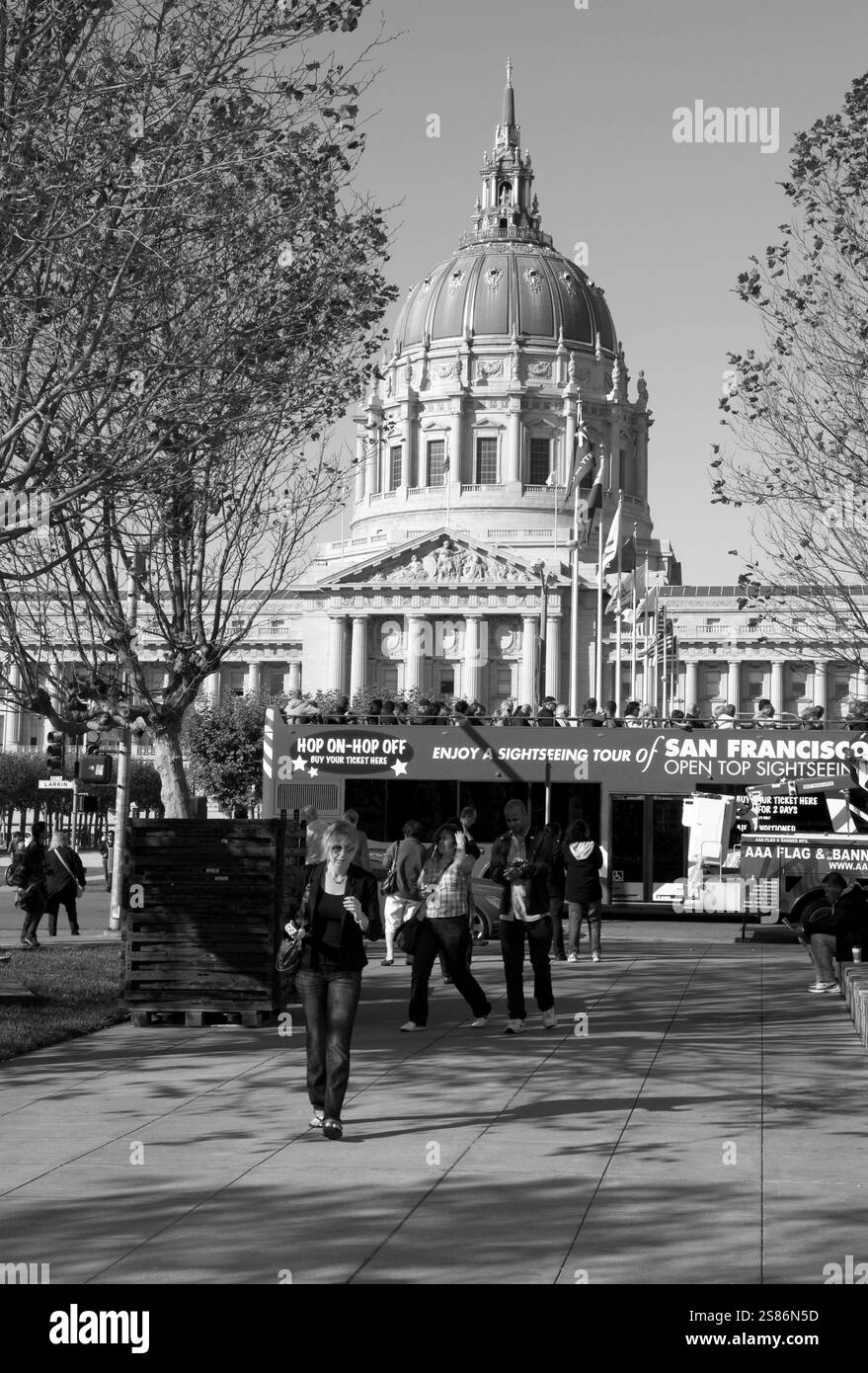 Double-decker tour bus passing in front of the historic California ...