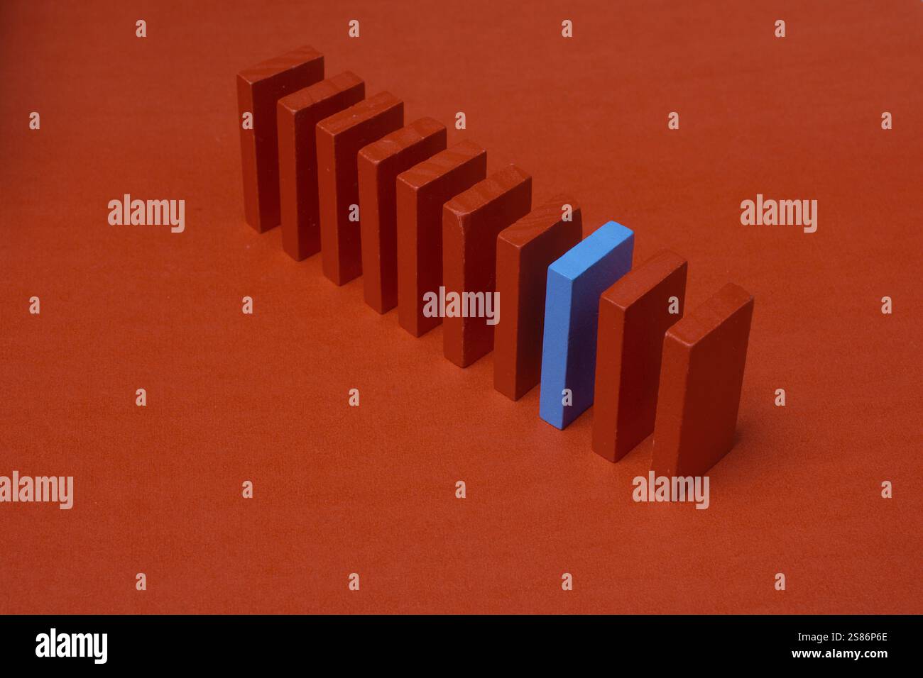 Colorful dominoes. Rainbow colored chain reaction Stock Photo - Alamy