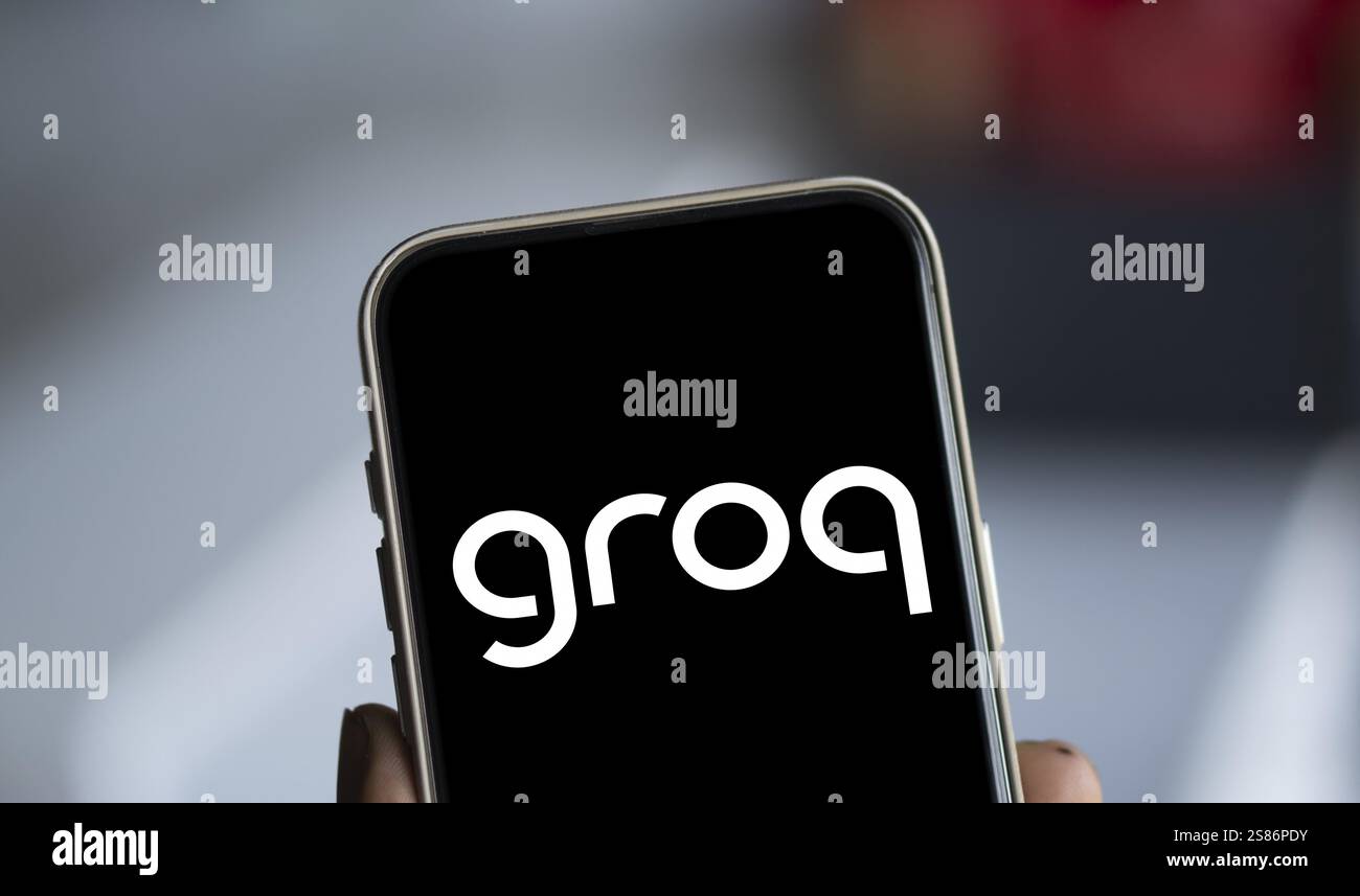 Groq logo is displayed on smartphone. Groq, Inc. is an American ...