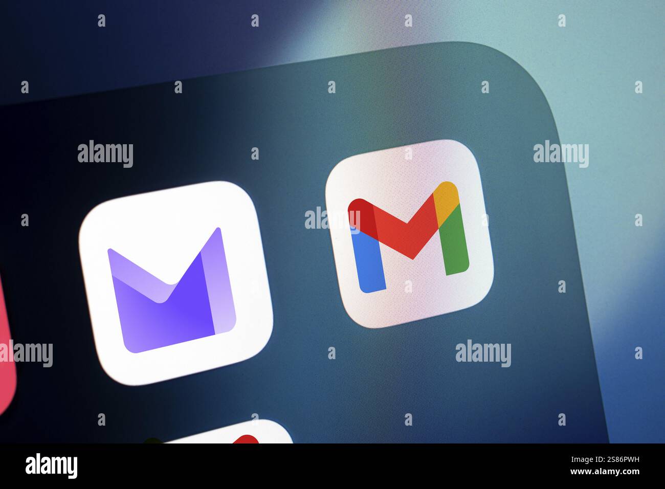 A close up of an iPhone screen displaying the Google Gmail and Proton ...