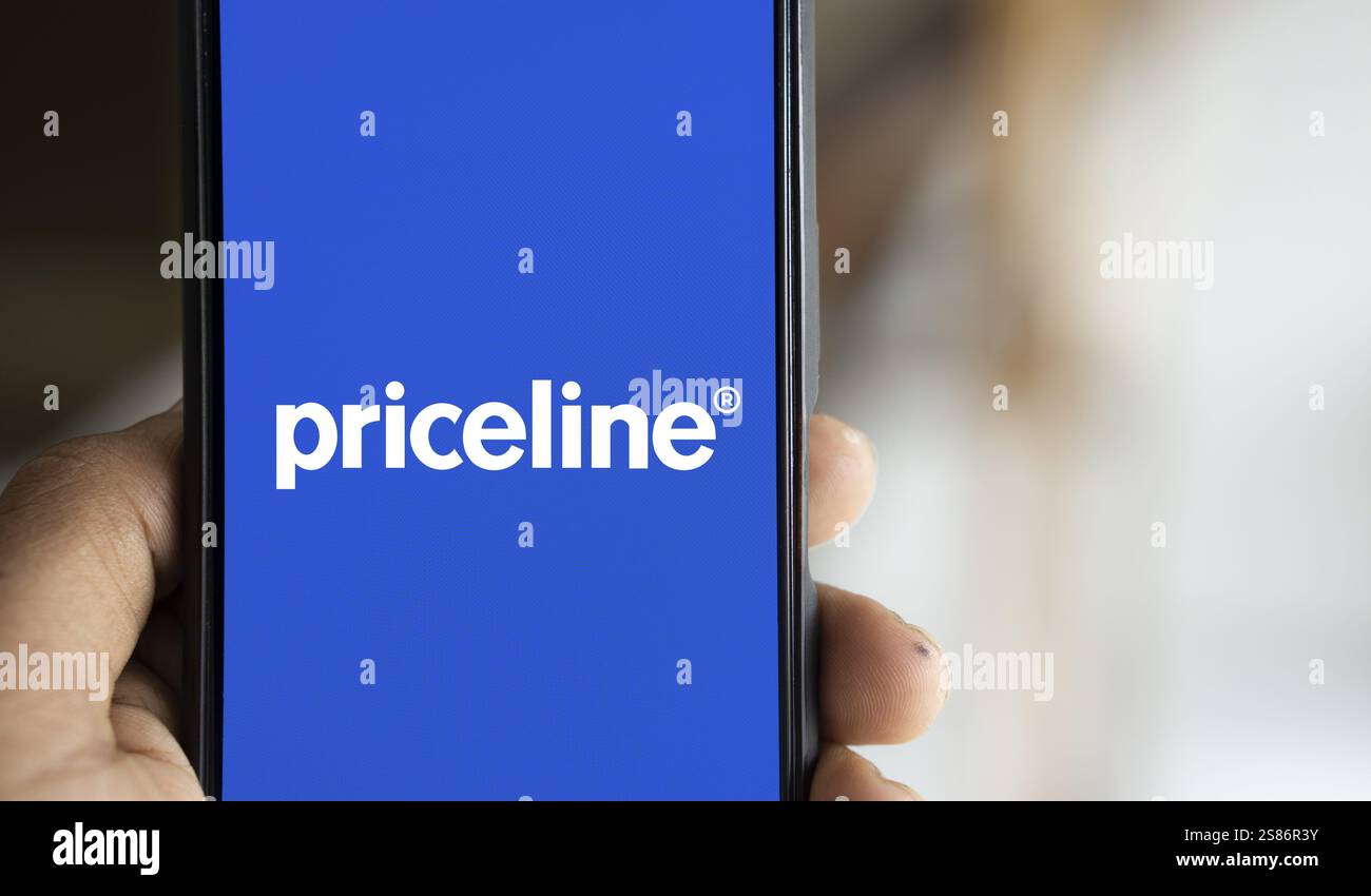 priceline logo is displayed on smartphone. is an online travel agency ...