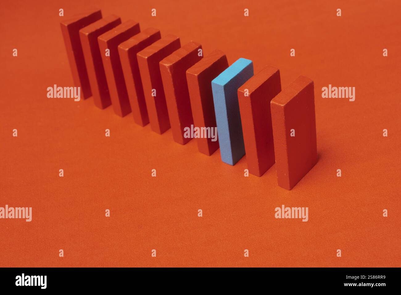 Colorful dominoes. Rainbow colored chain reaction Stock Photo - Alamy