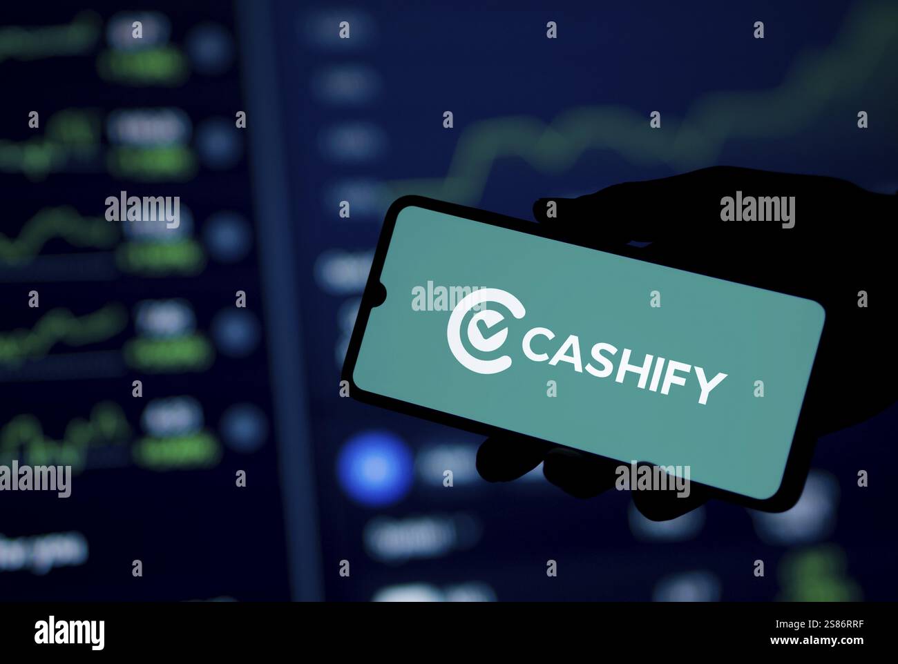 Cashify logo is displayed on smartphone. Cashify is a leading online ...