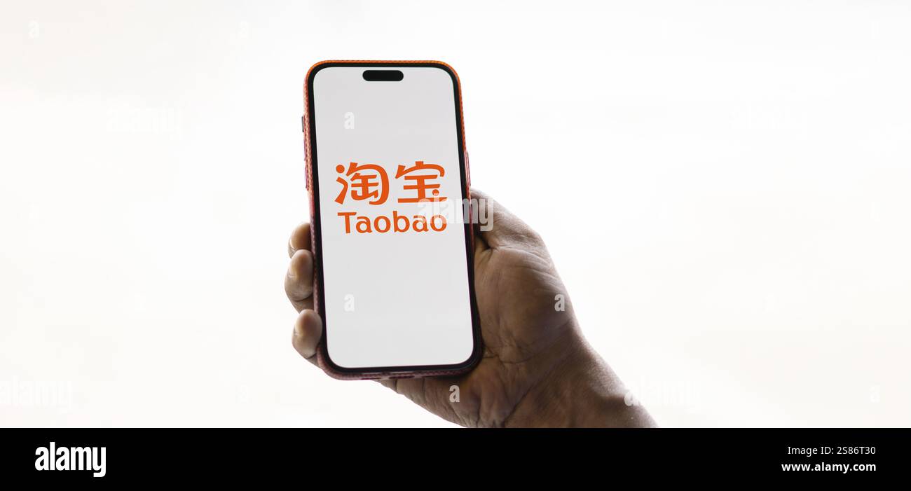 taobao logo is displayed on smartphone.Taobao is a Chinese online ...