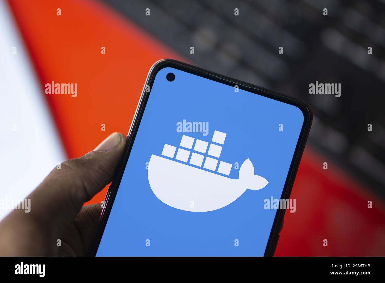 docker logo is displyed on smartphone.Docker is a set of platform as a ...