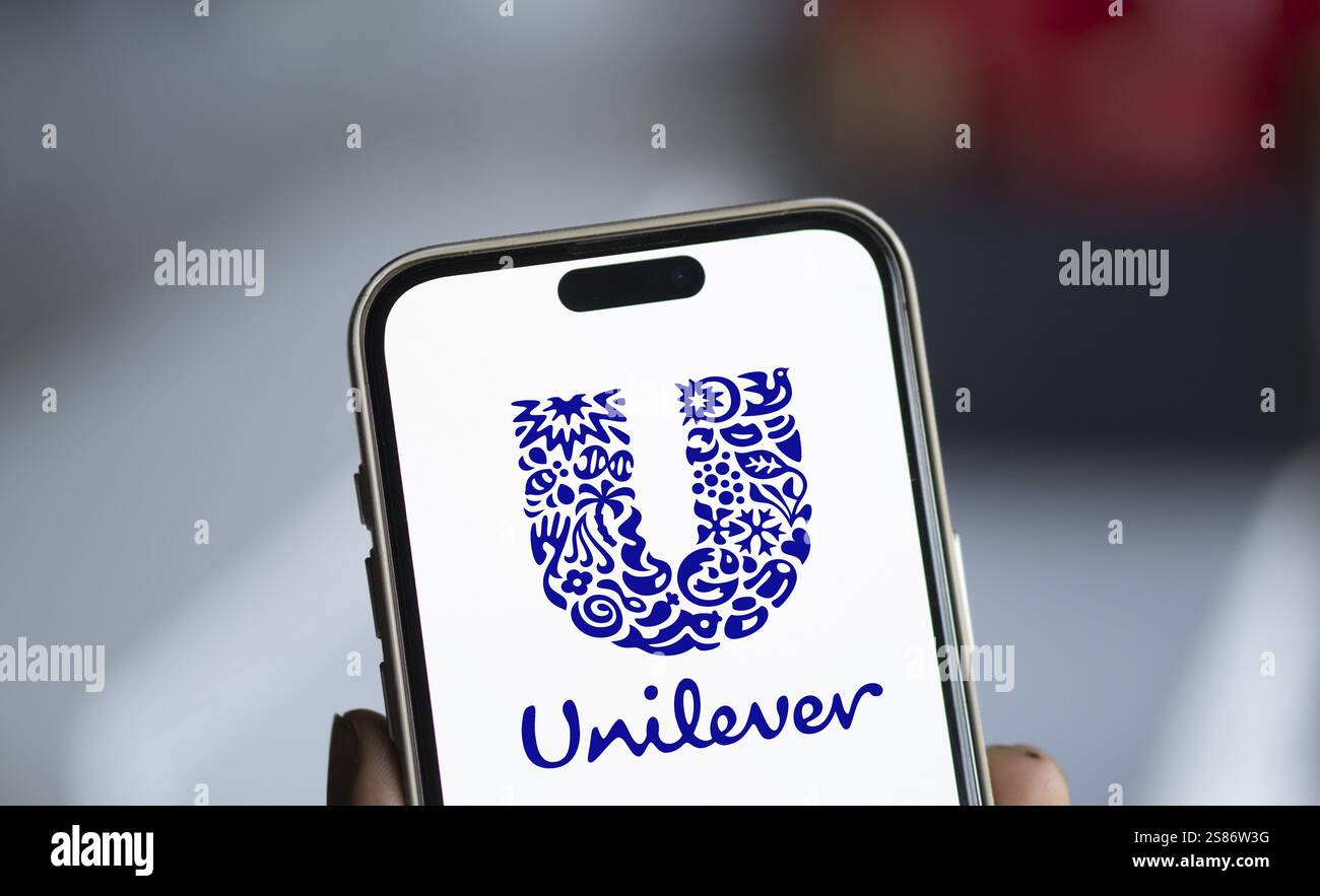 unilever logo is displayed on smartphone. Unilever PLC is a British ...