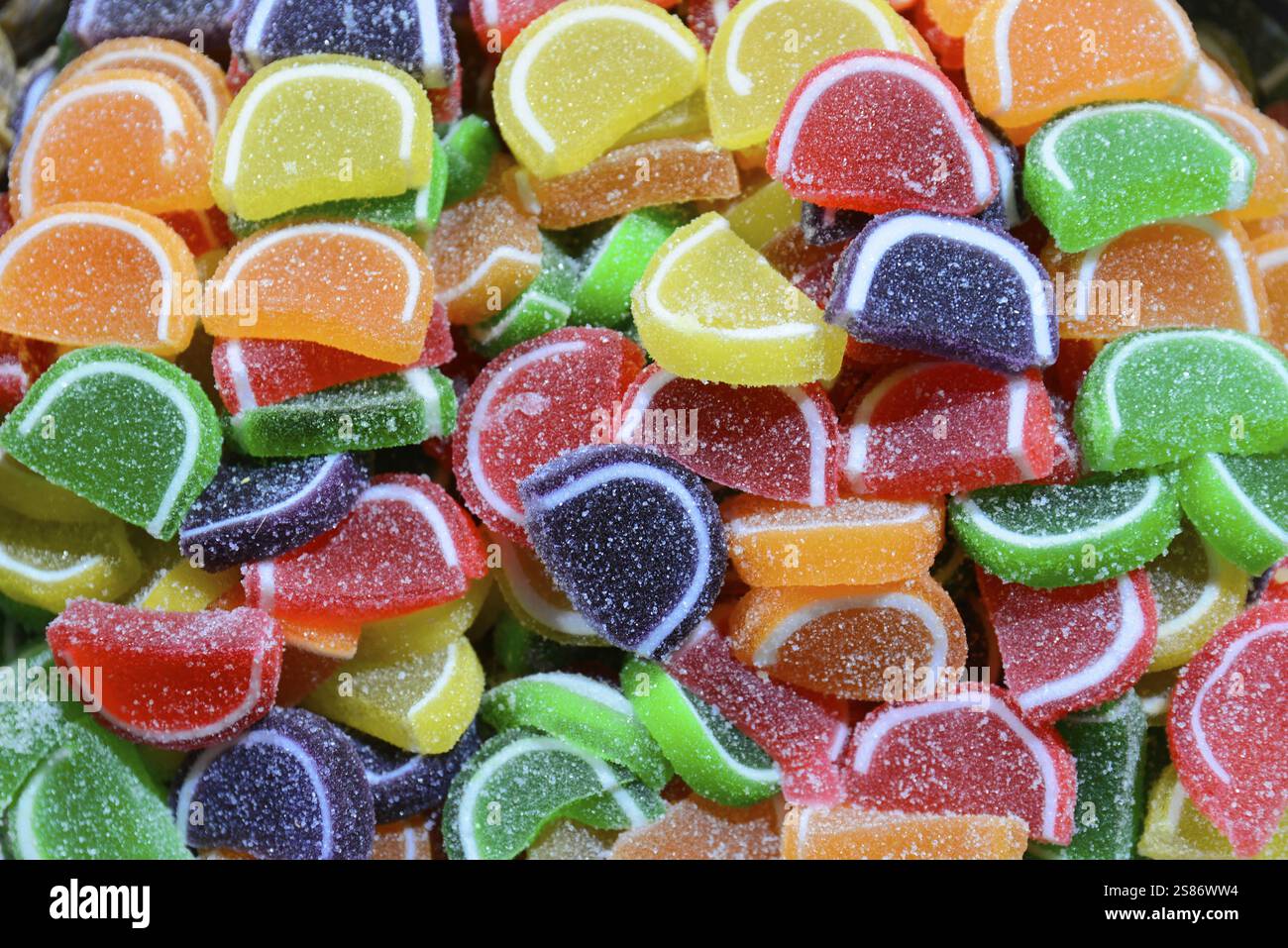 Colourful fruit gums with sugar coating in various colours and flavours ...